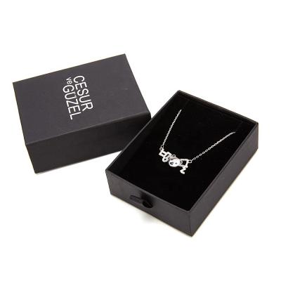 China Black 157gsm Luxury Leather Magnetic Jewelry Box with EVA Sponge Inlay Customizable for sale