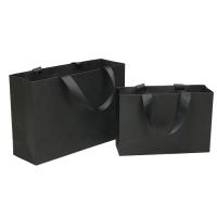 China Custom Printed Luxury Black Paper Carrier Bags B9 W9 Corrugated ODM Logo 128gsm for sale