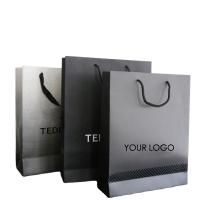 China PMS 300gsm CCNB Black Shopping Bags Custom Logo Jewelry Packaging Paper Bag for sale