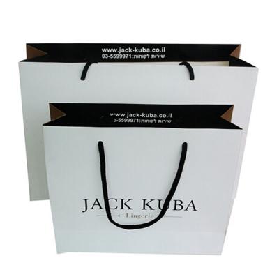 China Custom Kraft Paper Shopping Bags with Handles Offset Printing 300gsm C1S C2S for sale