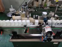 China Labeling Machine For Round Bottle Jar Vertical Label Sticker 20-50pcs/Min for sale