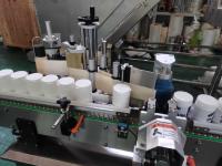 China Labeling Machine For Round Bottle Jar Vertical Label Sticker 20-50pcs/Min for sale