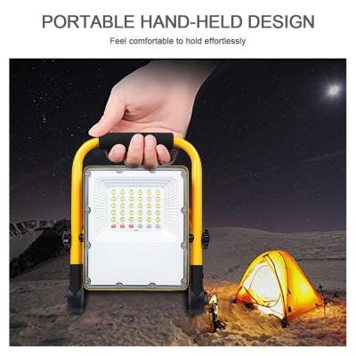 China Foldable Cordless Mini LED Work Light 30W 60W 100W with Bracket for Garage and Outdoor Use for sale