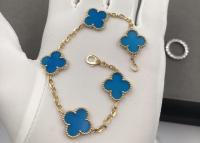 China Yellow 18k Gold Bangle Bracelet Magic Alhambra Bracelet 5 Motifs With Lapis Lazul for sale