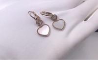 China Attractive 0.1carat Chopard Happy Diamond Heart Earrings For Ladies for sale
