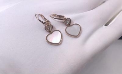 China Attractive 0.1carat Chopard Happy Diamond Heart Earrings For Ladies for sale