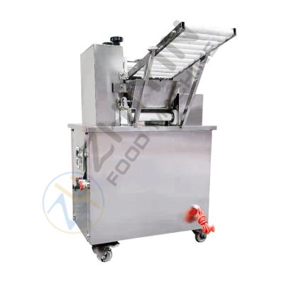 China Easy Operation Commercial Simulated Handmade Chinese Small Dumpling Machine for sale
