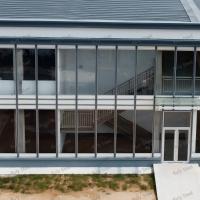 China Prefabricated Steel Structure Workshop with Glass Curtain Wall and Mezzanine Office for sale