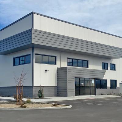 China Good Rust Prevention Prefabricated Steel Warehouse With Parapet Wall for sale