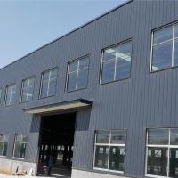 China Good Rust Prevention Prefabricated Steel Warehouse With Parapet Wall for sale