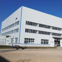 China Good Rust Prevention Prefabricated Steel Warehouse With Parapet Wall for sale