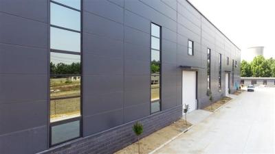 China Insulated Prefab Steel Warehouse with Aluminized Zinc Cladding for sale