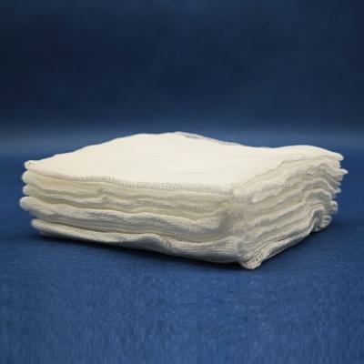 China Non-Sterile Compressed Gauze Pads 10x10cm 7.5x7.5cm 5x5cm 100% Cotton Medical Grade 100pcs Pack for sale
