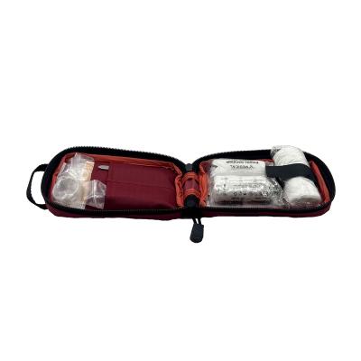 China Small Travel Outdoor First Aid Kit with 15 Medical Supplies - ISO Certified Compact Emergency Kit for sale