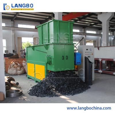 China Single Shaft Shredder Plastic Recycling Machine with 500-1000KG/HR Capacity 37KW Motor Power and 2 Years Warranty for sale