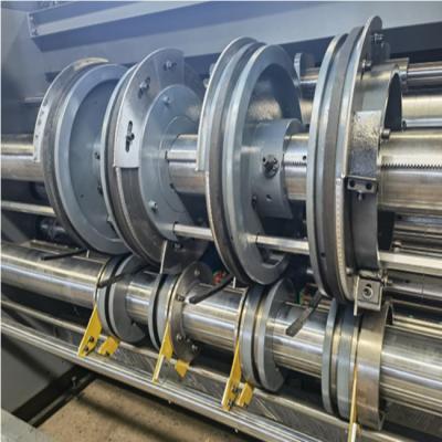 China Fast Speed Lead Eage Feeder Flexo Printing Slotting Die Cutting Machine 180pcs/Min for sale