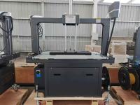 China Semi-Automatic 1200mm Carton Box Strapping Machine with One Year Warranty for Efficient Packing for sale