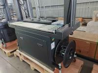 China 1200mm Semi Automatic Pedal Control Carton Box Strapping Machine for Carton Binding for sale