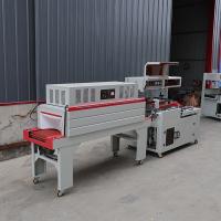China Compact Food Fully Automatic Shrink Wrapping Machine Pneumatic Packaging Machine for sale