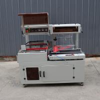 China Stainless Steel Fully Automatic Shrink Wrapping Machine 220V / 50Hz PLC Control for sale