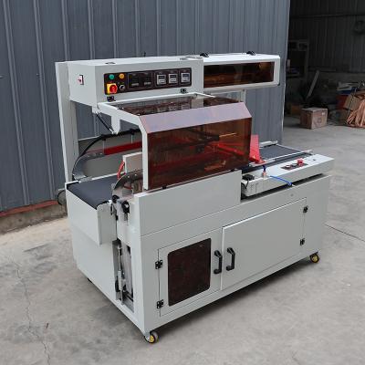 China 220V / 50Hz Fully Automatic Shrink Wrapping Machine Pneumatic Packaging Machine for sale
