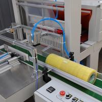 China PLC Control Cuff Style Shrink Film Wrapping Machine With 0 - 15m/Min Conveying Speed for sale
