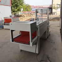 China Cuff Style Semi Auto Shrink Wrapping Machine PVC POF Film High Speed Shrink Wrapper for sale