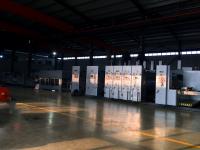 China Carton Box Package Line Automatic Flexo Printing Slotting Die Cutting Folding Gluing Bundling Machine for sale