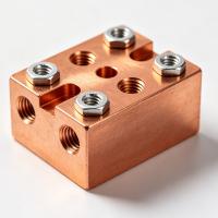 China CNC Machined C10200 OFHC Copper Terminal Block for BESS with 600A+ Current Rating for sale
