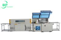 China Fully Automatic POF Heat Shrink Film Edge Sealer Wrapping Machine 70 Bags Per Minute for sale