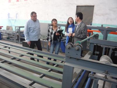 China Heat Preserving Layer Roof Tile Making Machine for Construction Material Making for sale