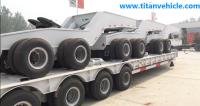 China Titan Lowbed trailer ,4line 8 axle lowbed trailer loading capacity 150tons with 2 line 4 axle dolly for sale