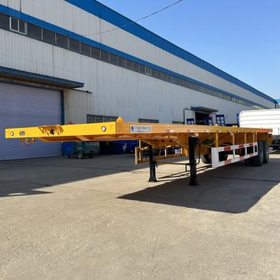 China TITAN 2/Tri/3 Axle 20/40/45 Ft Flatbed Semi Trailer for Sale Manufacturers Near Me in Tanzania for sale