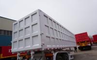 China TITAN VEHICLE 2 axle 30 cbm steel semi end dump trailers for  bad road work for sale