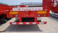China What is the price on your 3 axle flatbed container transportation trailer? for sale