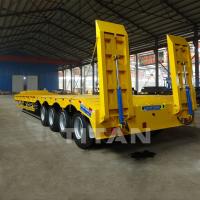 China 4 axle low bed trailer 100 ton  with the hydraulic ramps for sale