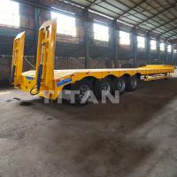 China 4 axle low bed trailer 100 ton  with the hydraulic ramps for sale