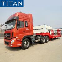 China TITAN 3 axles lowbed trailer 70 tons low platform transport trailer for sale