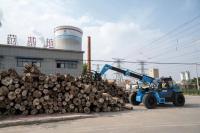 China 4WD 3.5 Tons Telescopic Forklift With Bale Clamp For Straw Pile And Paper Roll for sale