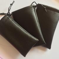 China PU Gold-Stamped Leather Bag, High-Grade PU Spring-Type Automatic Storage Bag, Drawstring Cloth Bag, Coin And Key Storage Leather Bag, Headband-Style Data Cable Storage Bag for sale