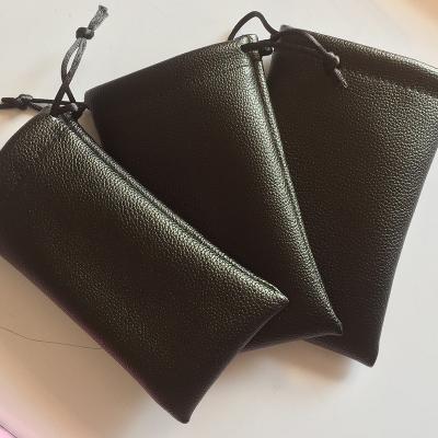 China PU Gold-Stamped Leather Bag, High-Grade PU Spring-Type Automatic Storage Bag, Drawstring Cloth Bag, Coin And Key Storage Leather Bag, Headband-Style Data Cable Storage Bag for sale