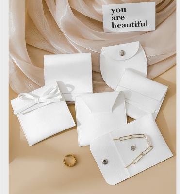 China Customized LOGO White Velvet Bag Jewelry Accessories Thickened Snap Button Bag Anti-Oxidation Jewelry Storage Bag for sale