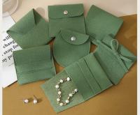 China Luxury bag Customized LOGO Green Flannel Anti-Oxidation Jewelry Bag Thickened Microfiber Jewelry Bag Ring Storage Bag for sale