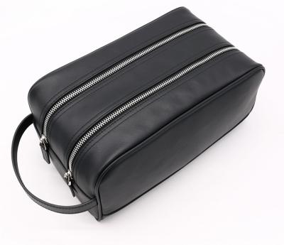 China Manufacturer Customized Genuine Leather Large Capacity Travel Cosmetic Bag Simple Light Luxury Toiletry Bag Multifunctional Double Layer Storage Bag for sale