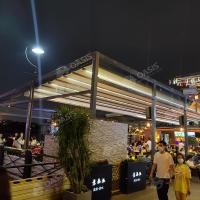 China Powder Coated Aluminum Retractable Fabric Pergola - 12M Width, Class 6 Wind Resistance for Outdoor Gardens for sale