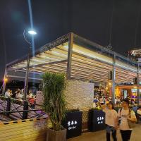 China 4m x 3m Aluminum Waterproof Pergola with PVC Fabric Roof and Remote Control - 110V/220V Motor, Class 6 Wind Resistance for sale