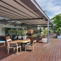 China Reinforced Aluminum Frame Remote Control Commercial Sunshade Awning 110V 220V for sale