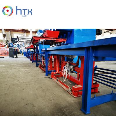 China Concrete Retaining Block Feeding Machine Dosing System Manufacturers Production Line for sale