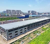 China Modern Prefab Steel Structure Building Recyclable For Industrial Warehouses Office House for sale