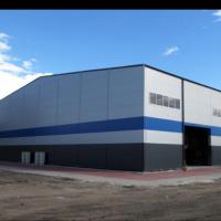 China Fire Retardant Prefab Steel Frame Buildings Warehouse With Sandwich Panel Roof for sale